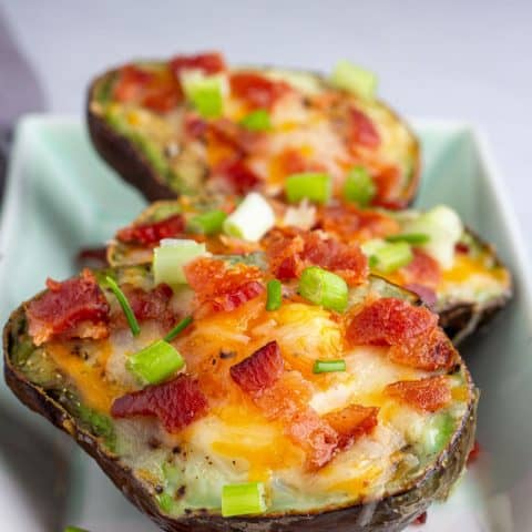 Loaded Avocados Stuffed with Eggs, Bacon & Cheese • Low Carb Nomad