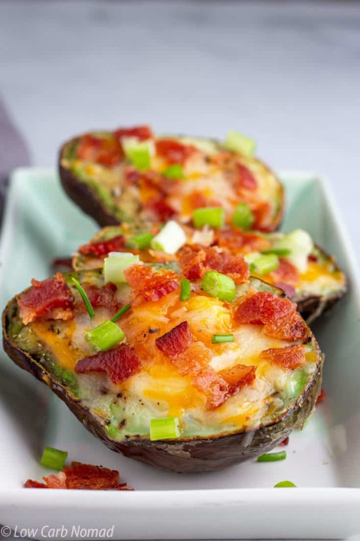 Loaded Avocados Stuffed with Eggs, Bacon & Cheese • Low Carb Nomad